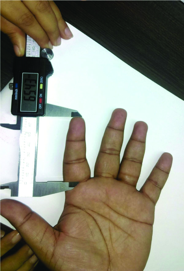 Digital Vernier Caliper taking measurement.