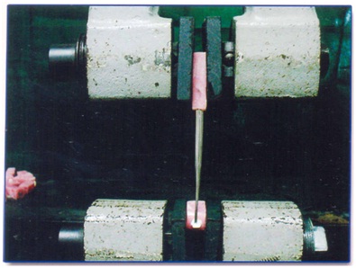 Fluorocore specimen loaded in universal testing machine