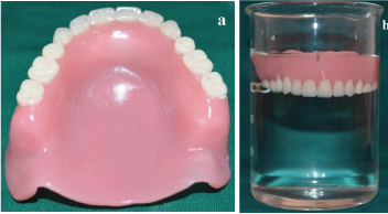 10. The denture was immersed in water overnight and weighed before and ...